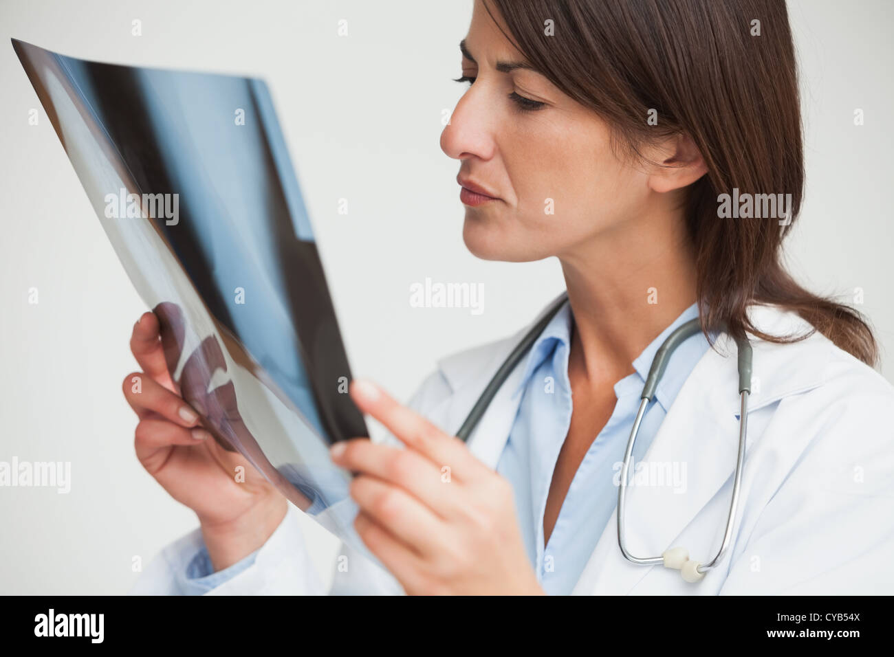 Female doctor studying x-ray Stock Photo - Alamy