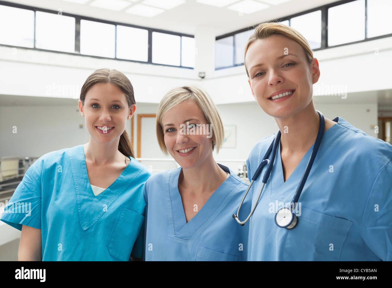 Three happy nurses Stock Photo - Alamy