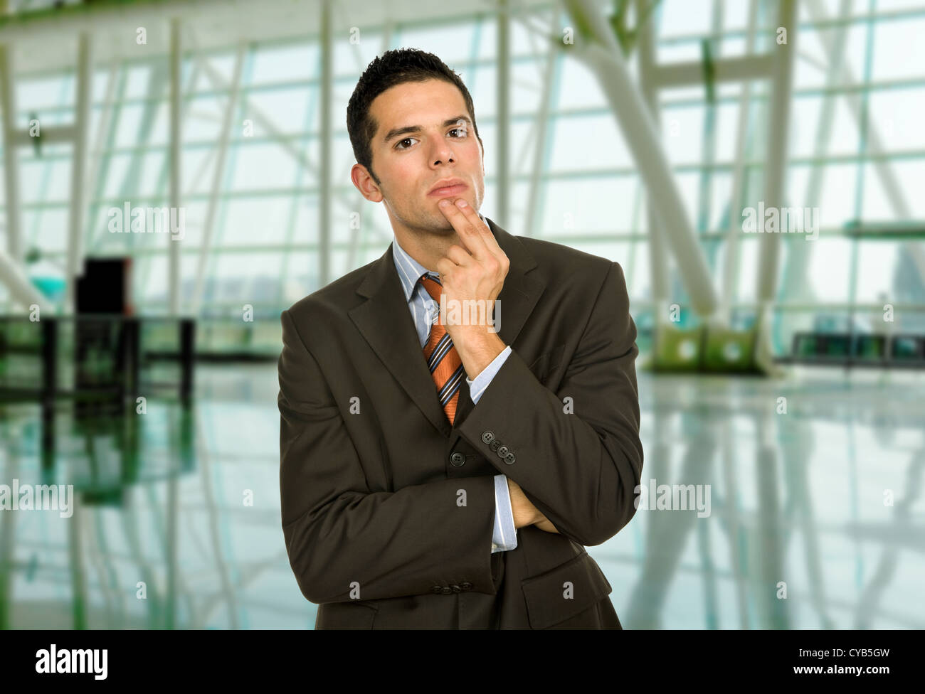 young business man thinking, at the office Stock Photo - Alamy
