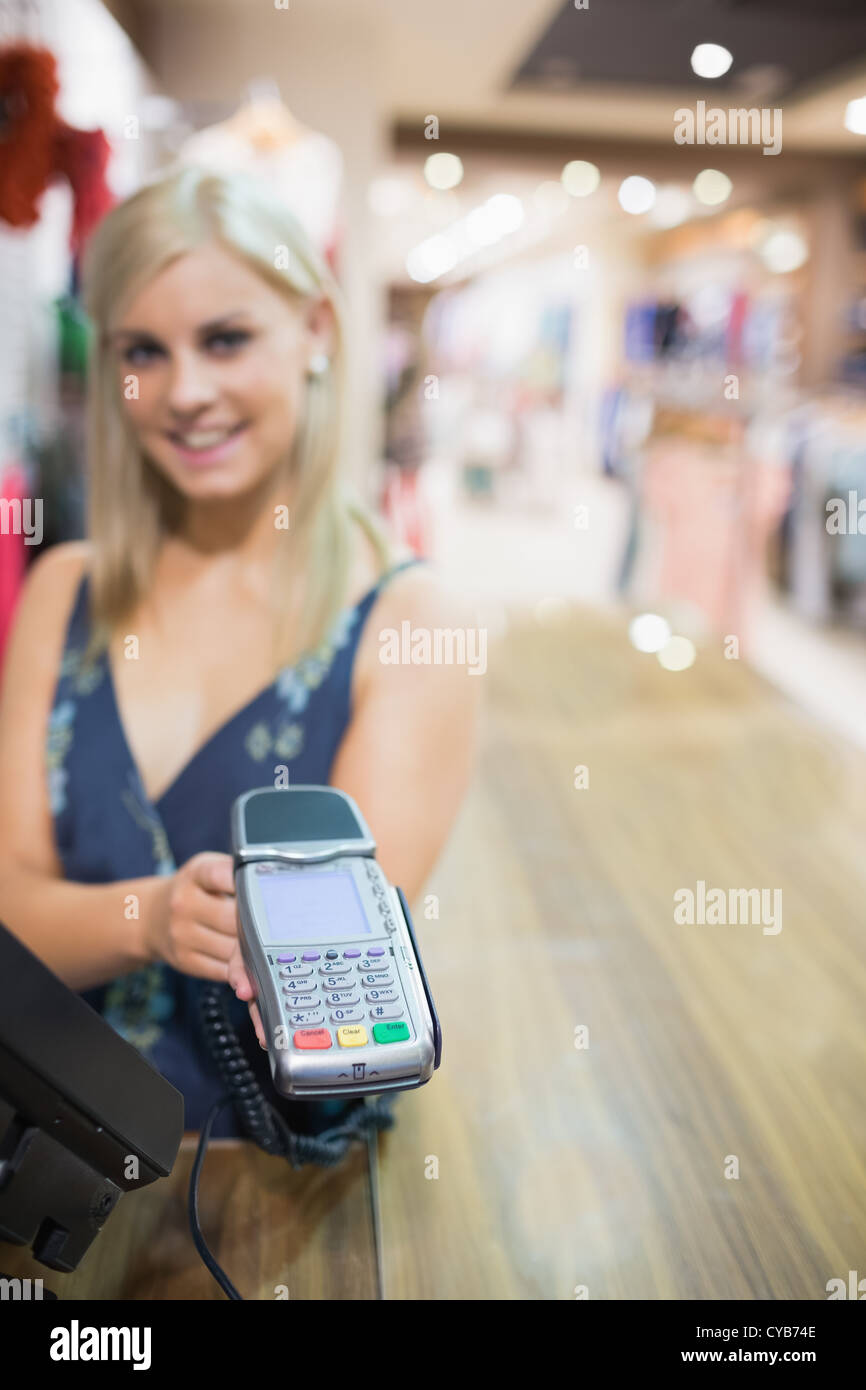 Woman card shop till handing hi-res stock photography and images - Alamy