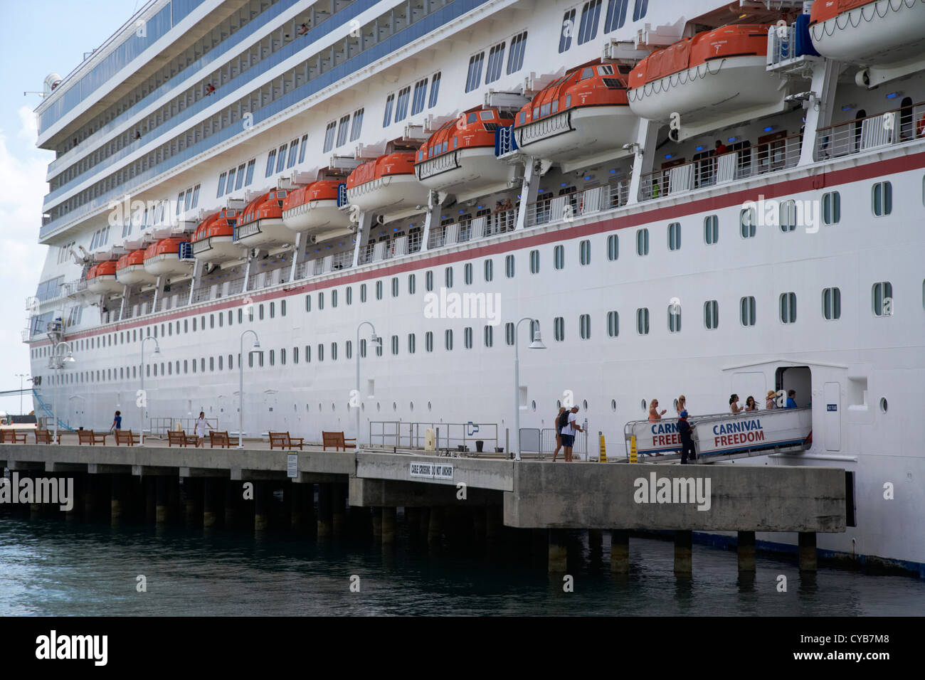passengers boarding carnival freedom cruise ship moored key west ...