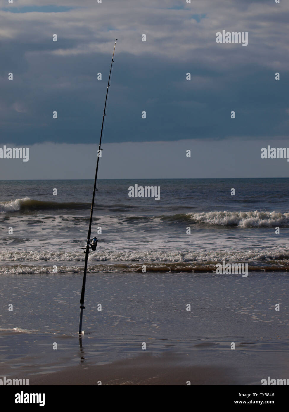 Fishing rod upright in the sand, Cornwall, UK Stock Photo - Alamy