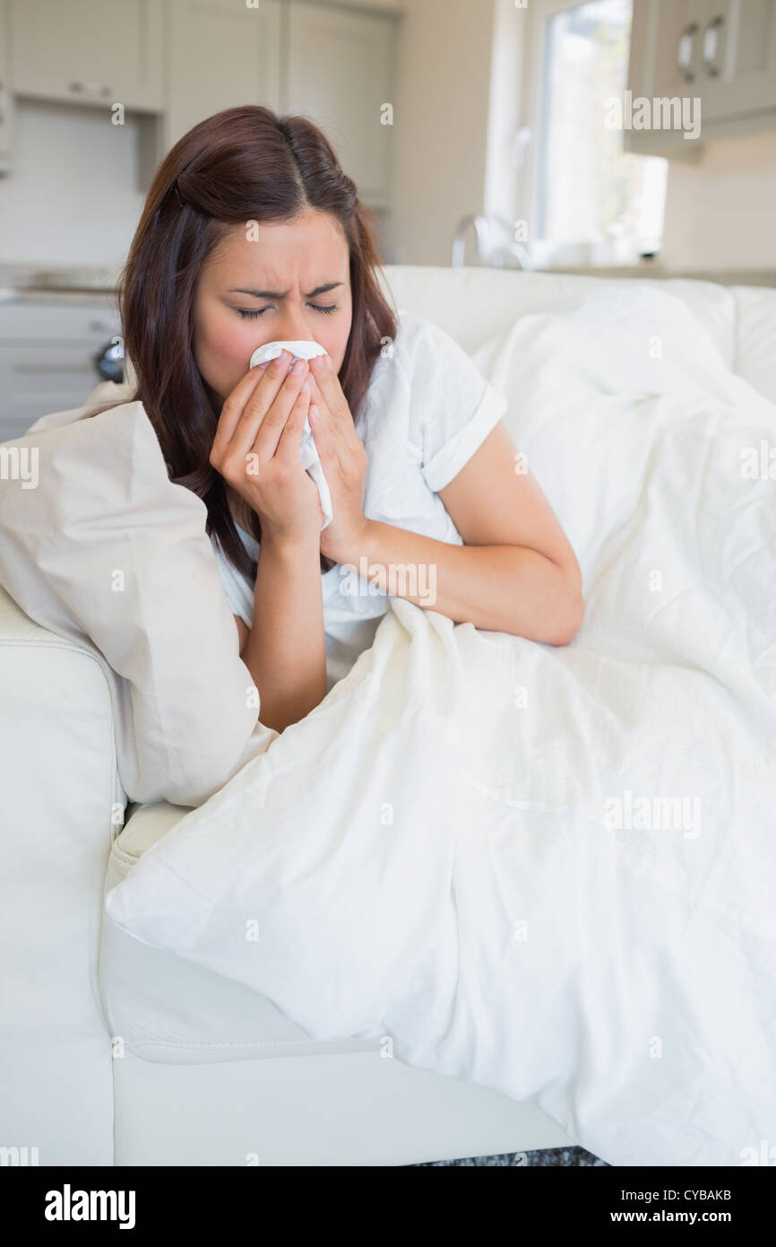 Brunette woman feeling sick Stock Photo - Alamy