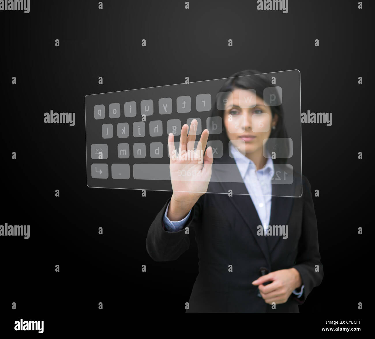 Woman typing on digital keyboard Stock Photo - Alamy