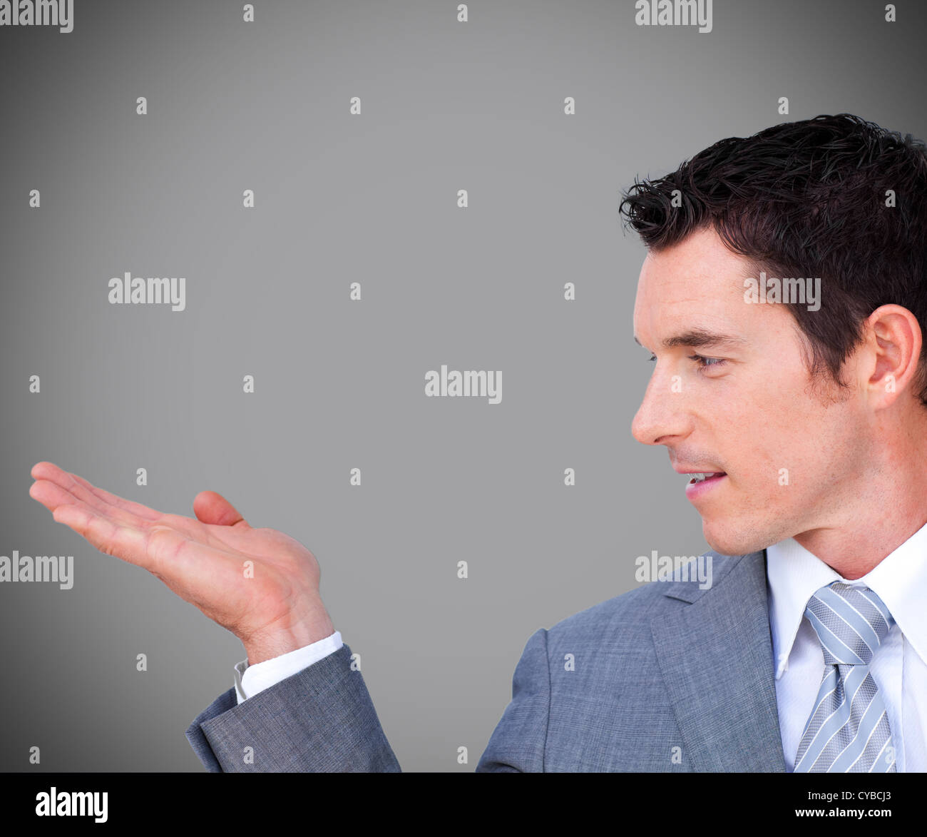 Businessman holding up hand Stock Photo - Alamy