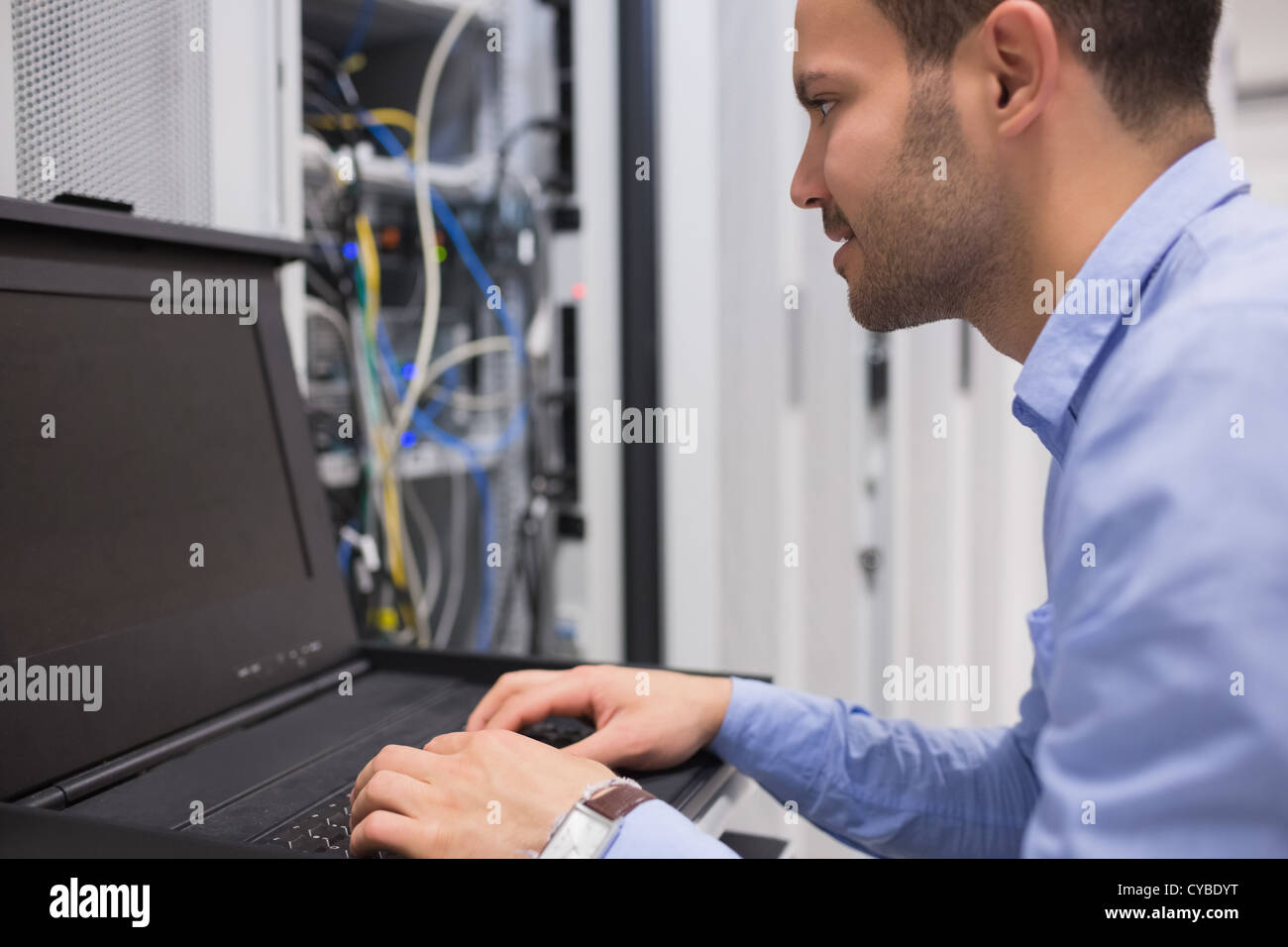 Man repairing servers Stock Photo - Alamy