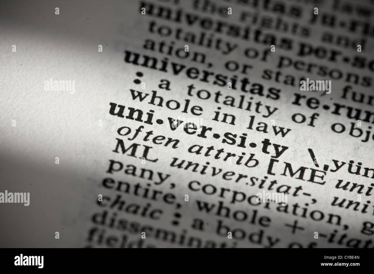 Closeup of a page in an English dictionary with the syllabicated word ...