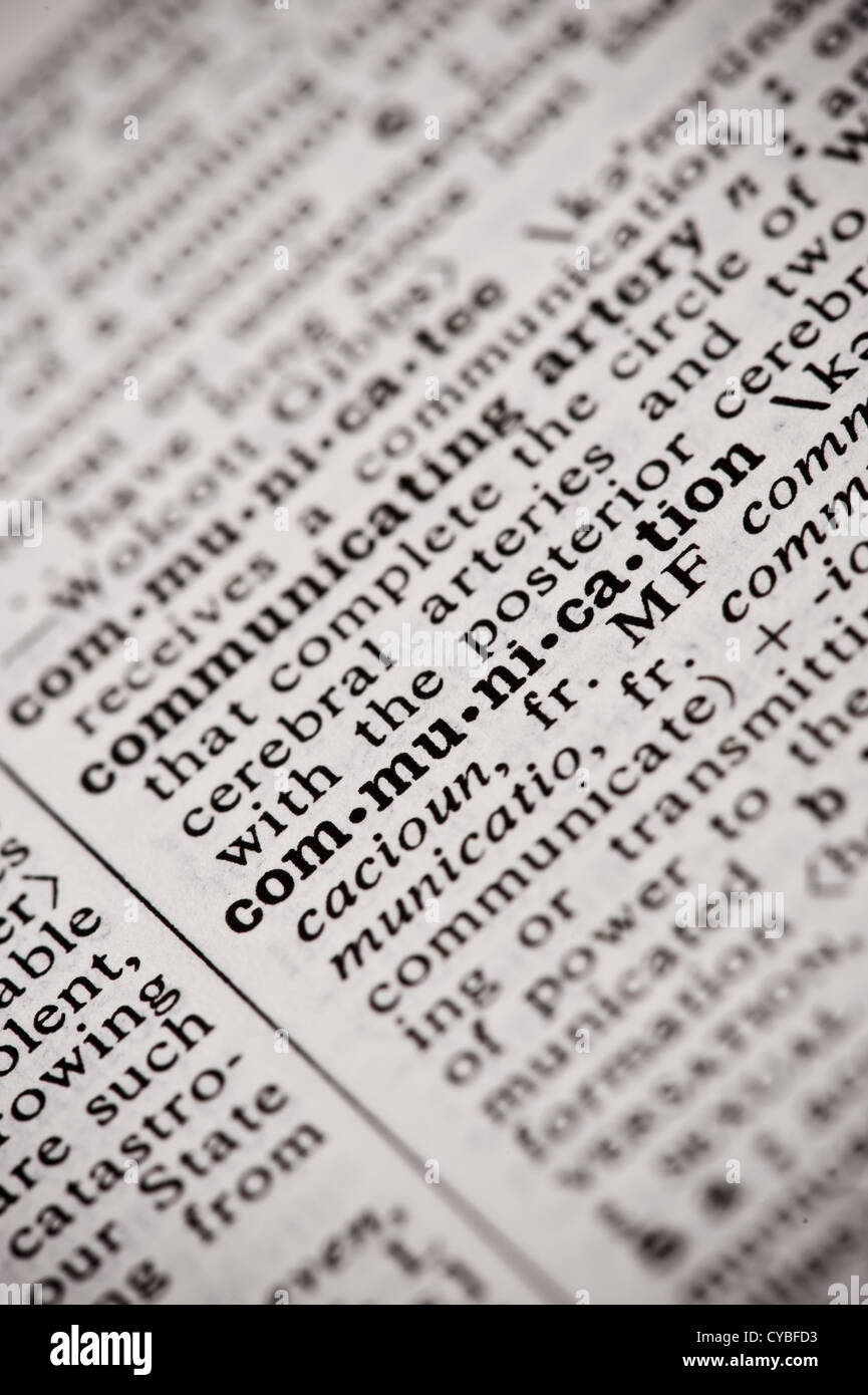 Closeup of the word "communication" split into five syllables along ...