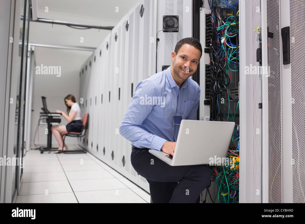 Two technicians doing data storage Stock Photo - Alamy