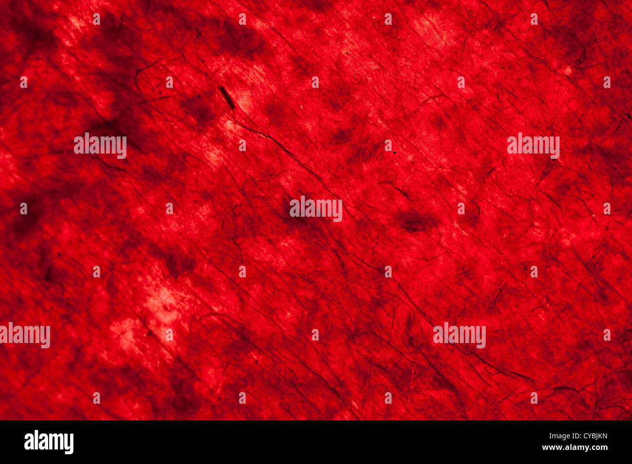 Light shining through hand made red art paper Stock Photo - Alamy