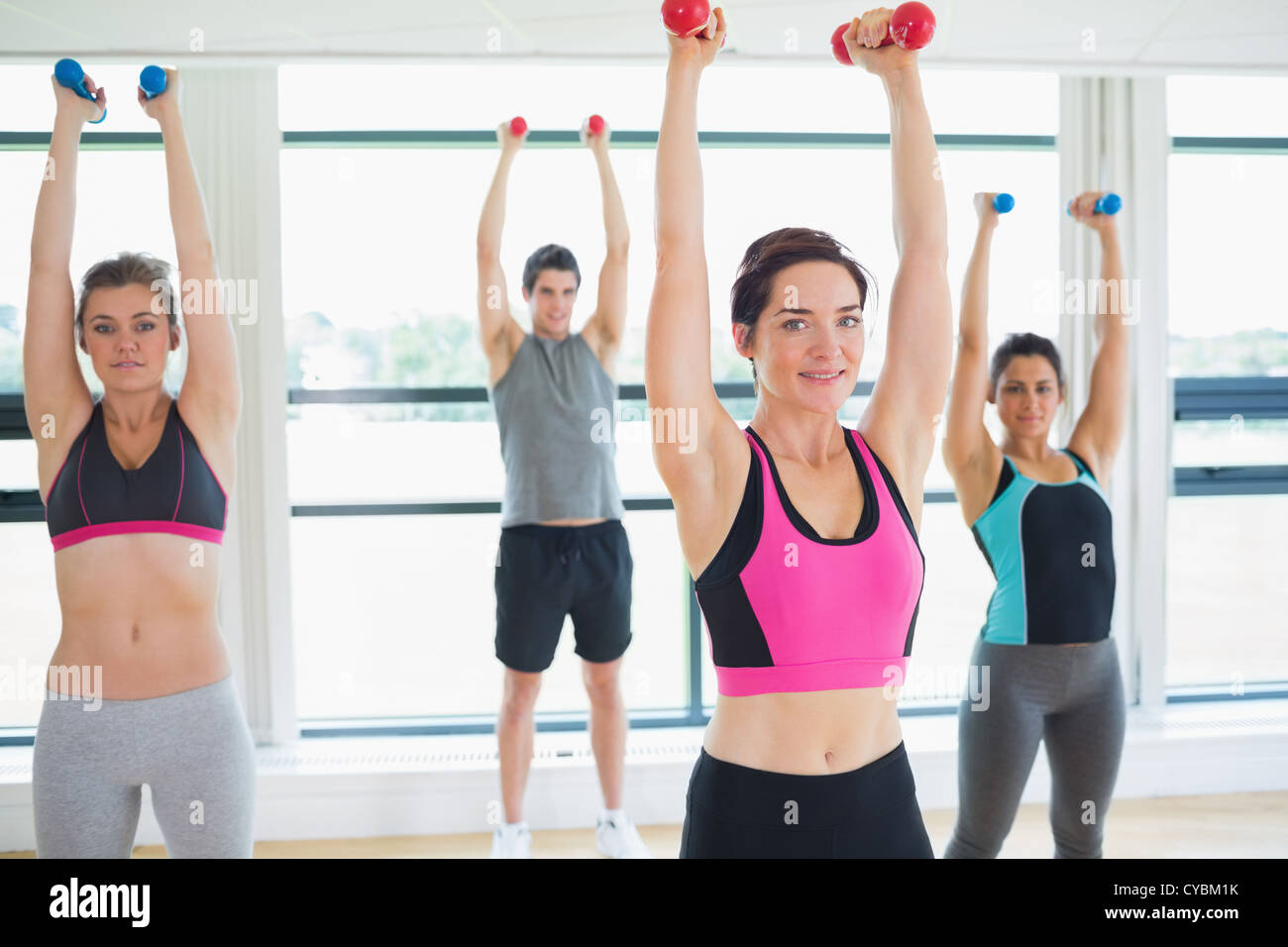 Women lifting weights Stock Photo - Alamy