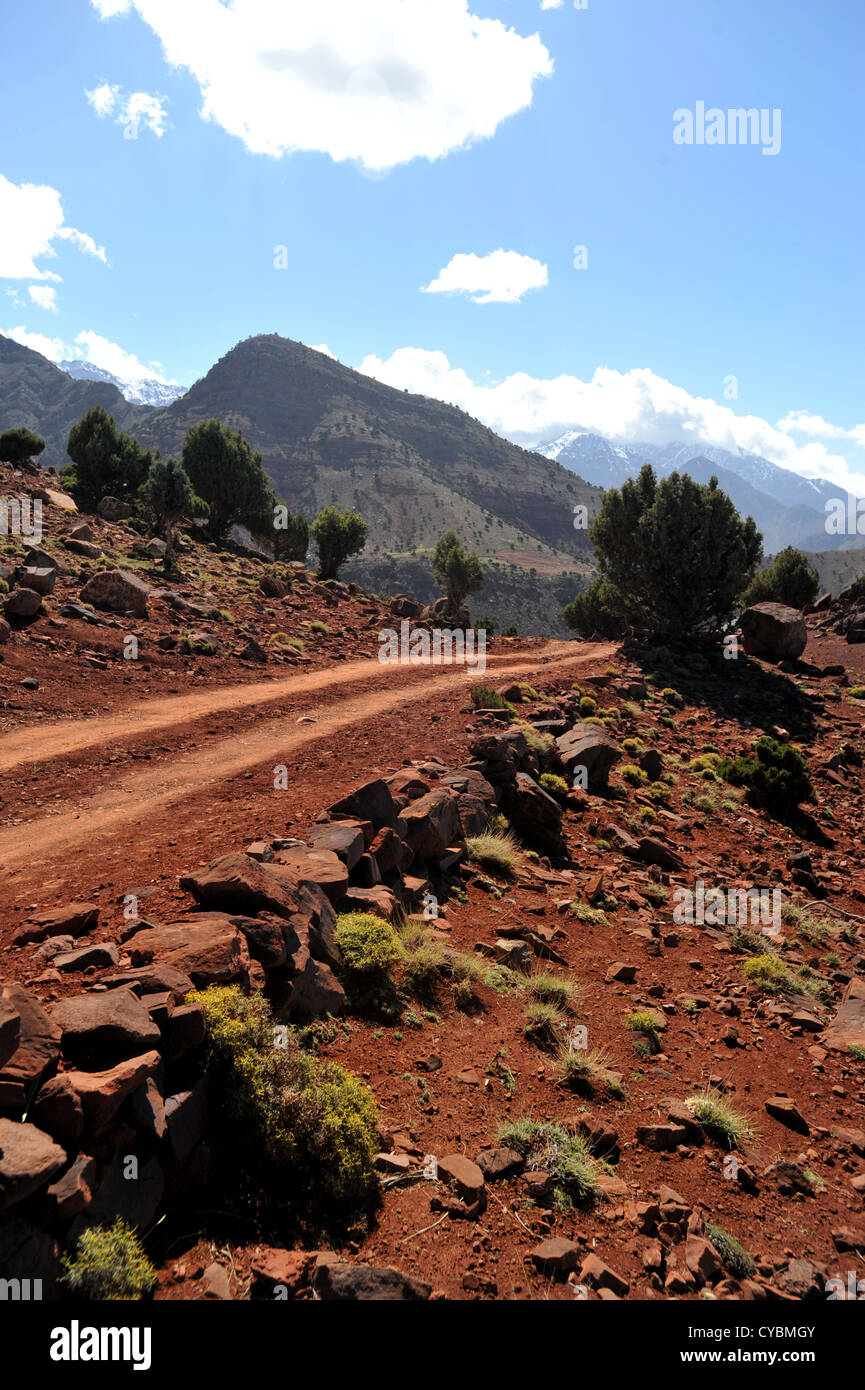 Dirt road in the Atlas mountains, Morocco. Dusty mountain trail ...