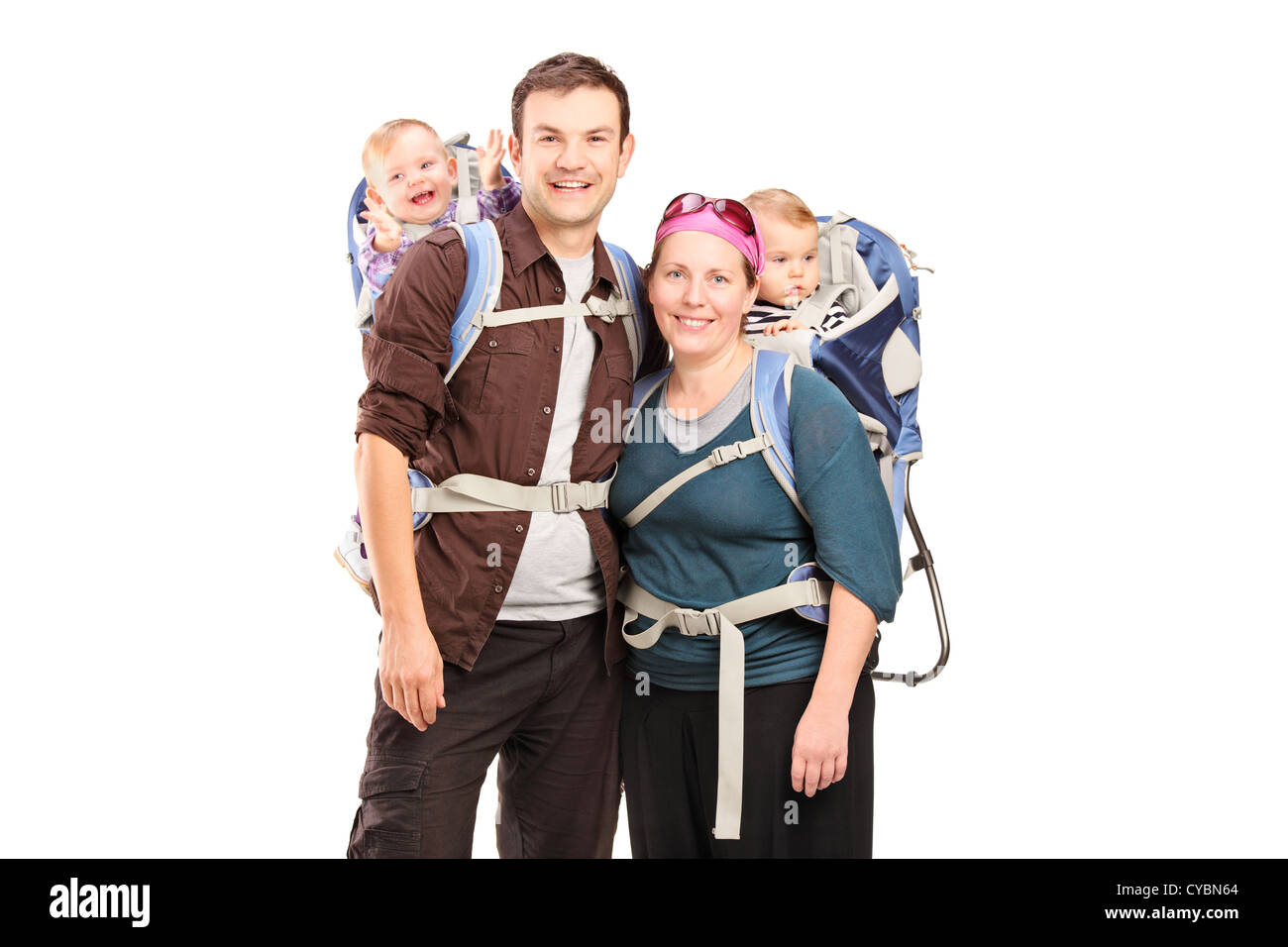 Happy family with hiking backpacks posing isolated on white background ...