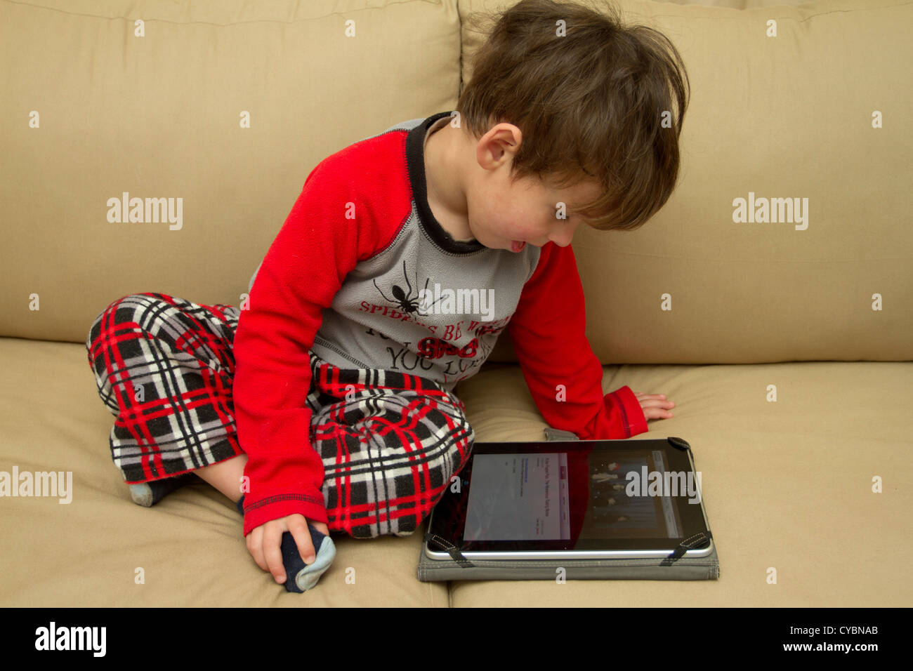 A 3-year old boy navigates the internet on an iPad Stock Photo - Alamy