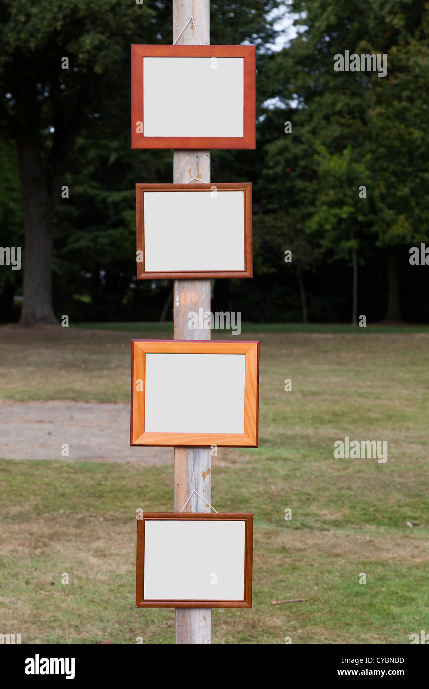 Picture Frame on wooden pole close up Stock Photo - Alamy