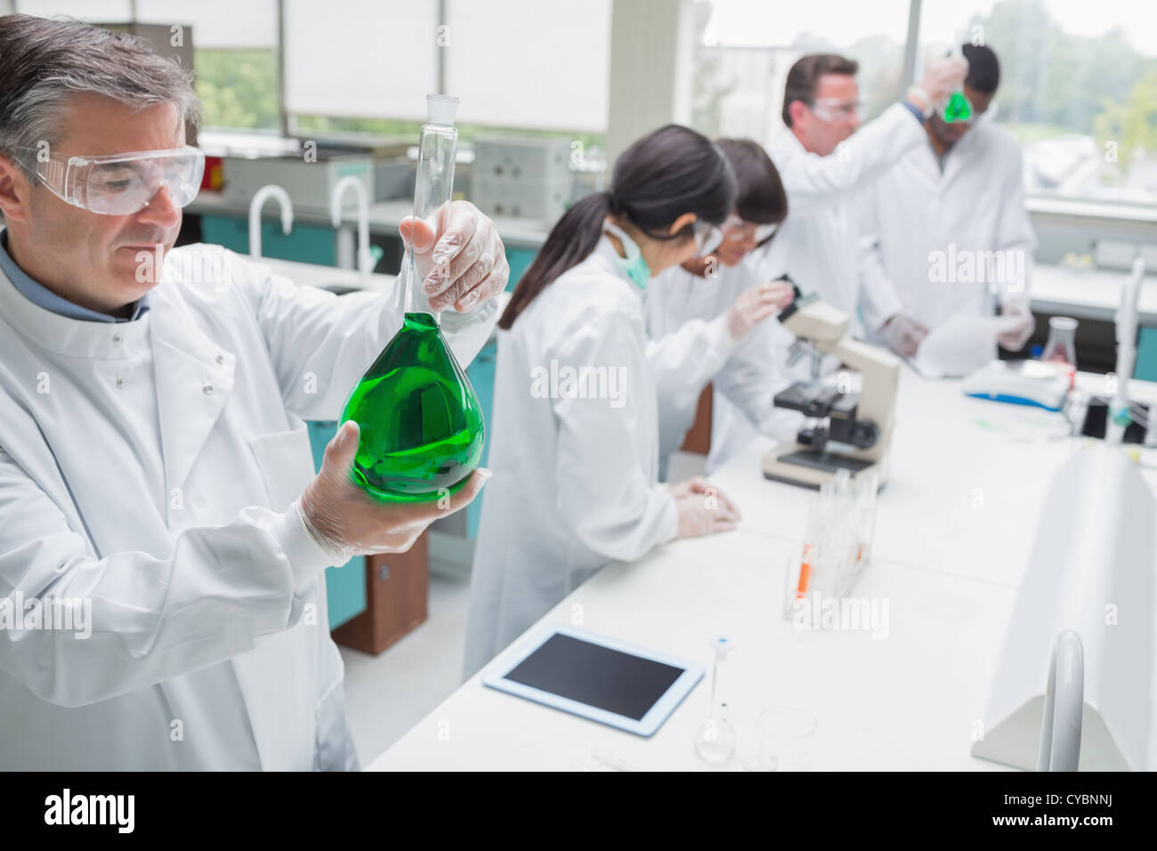 Chemists working in a laboratory Stock Photo - Alamy