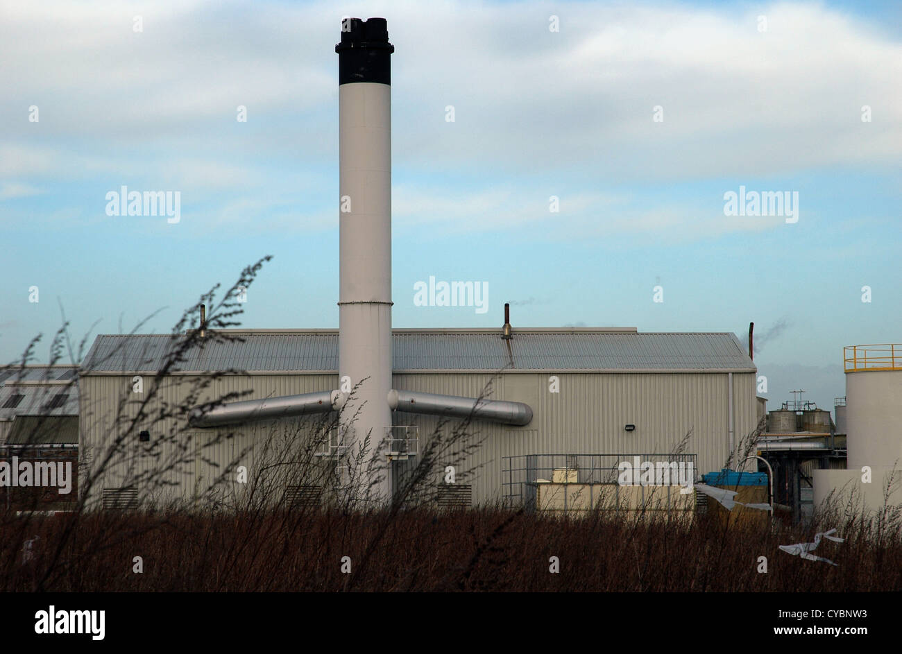 A factory smoke chimney or tower Stock Photo - Alamy
