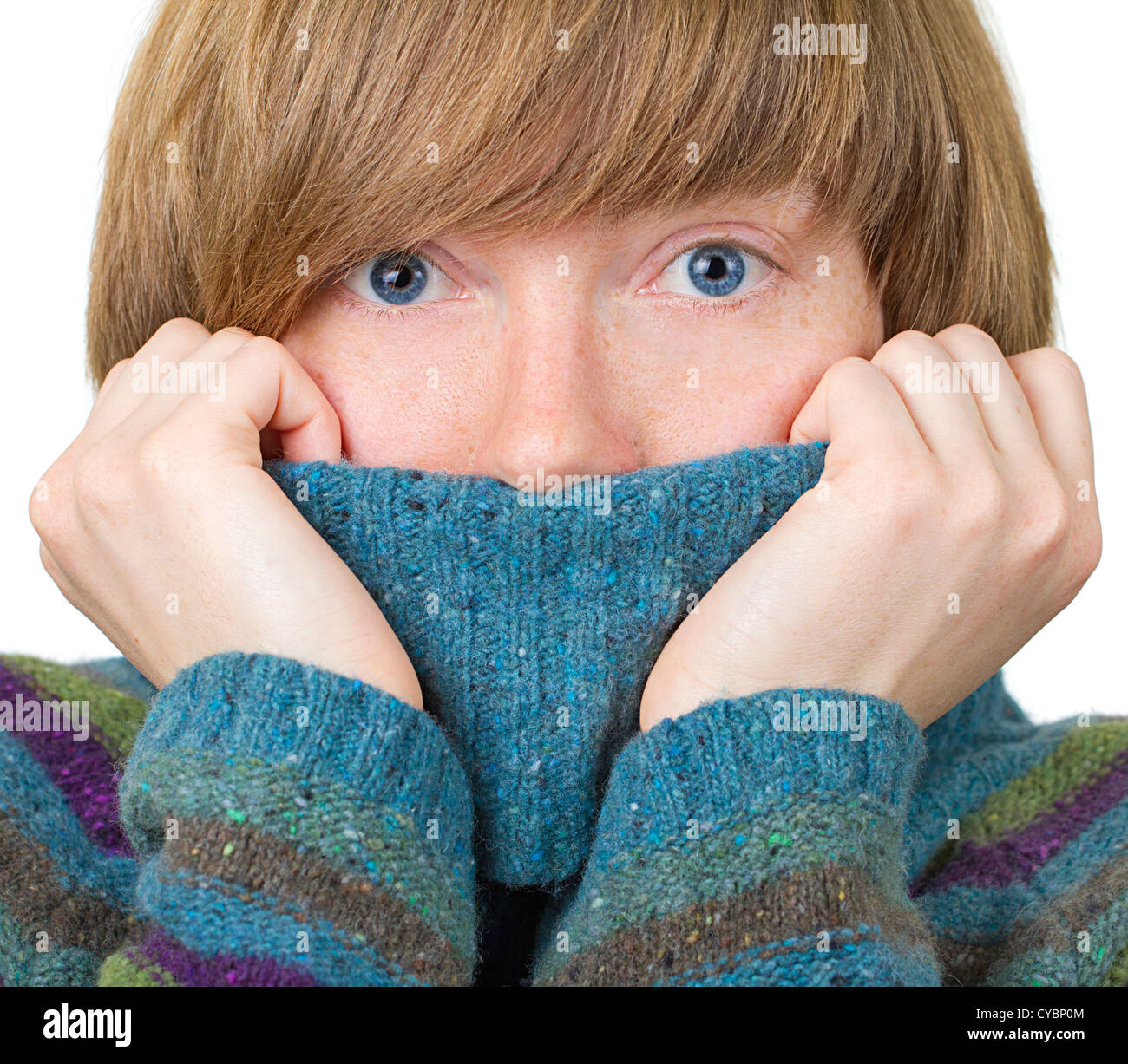 Pretty girl in winter clothes covering her face with warm scarf Stock ...