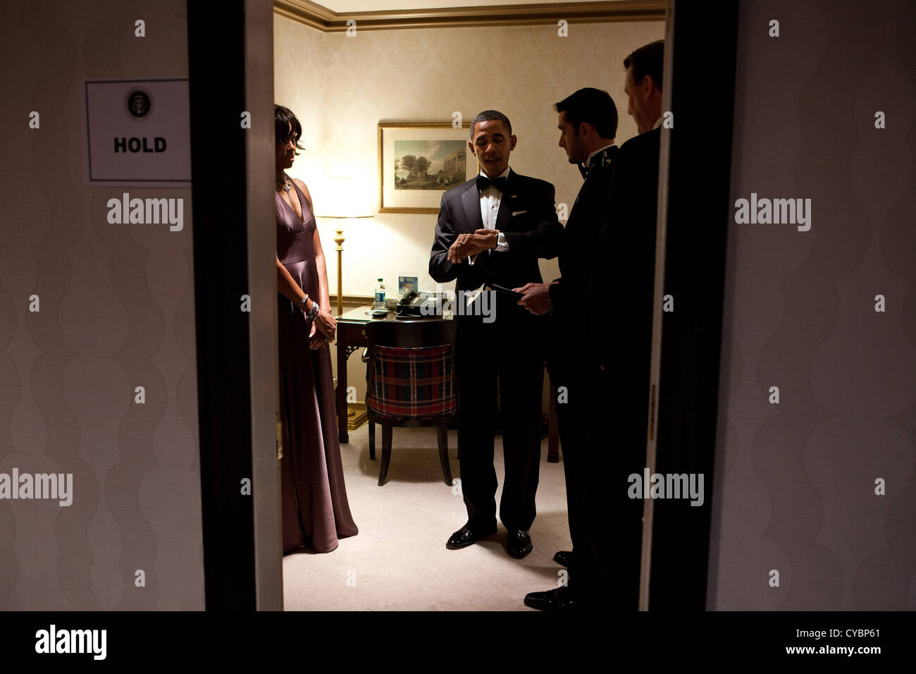 US President Barack Obama and First Lady Michelle Obama wait backstage ...