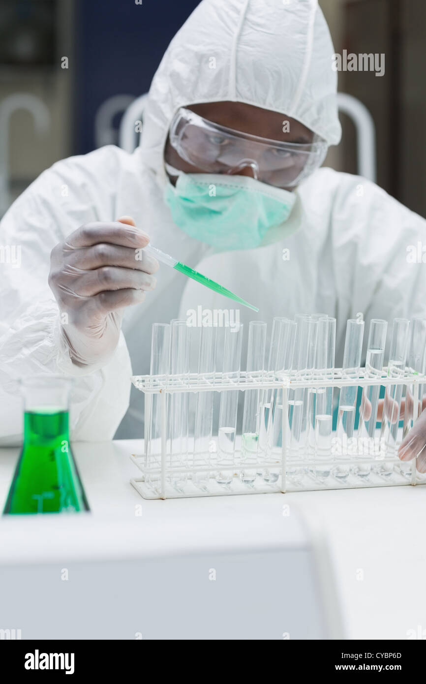 Scientist placing test tubes hi-res stock photography and images - Alamy