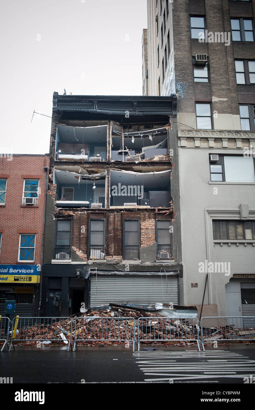 The facade of a building in Chelsea in New York is torn off during ...