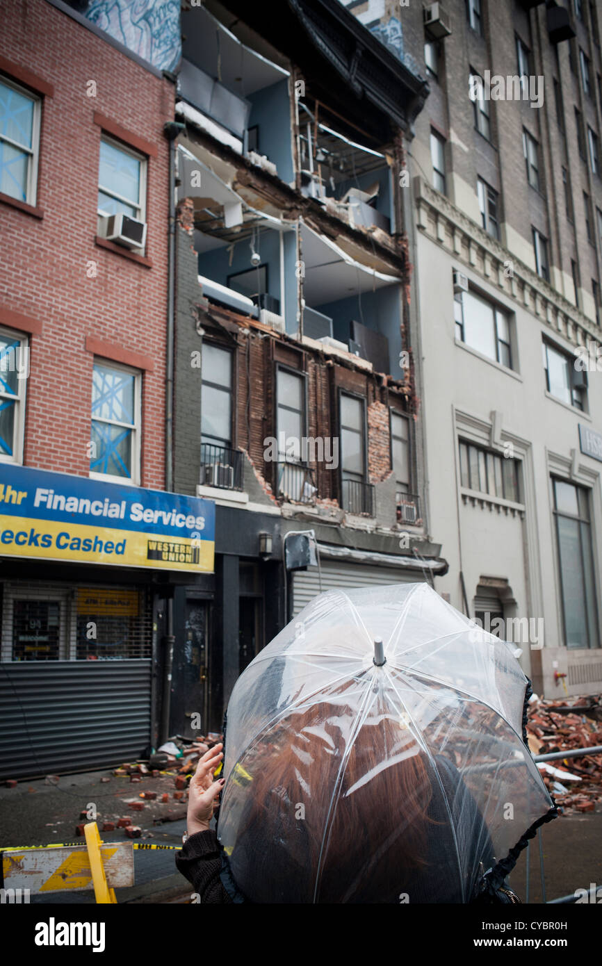 The facade of a building in Chelsea in New York is torn off during ...