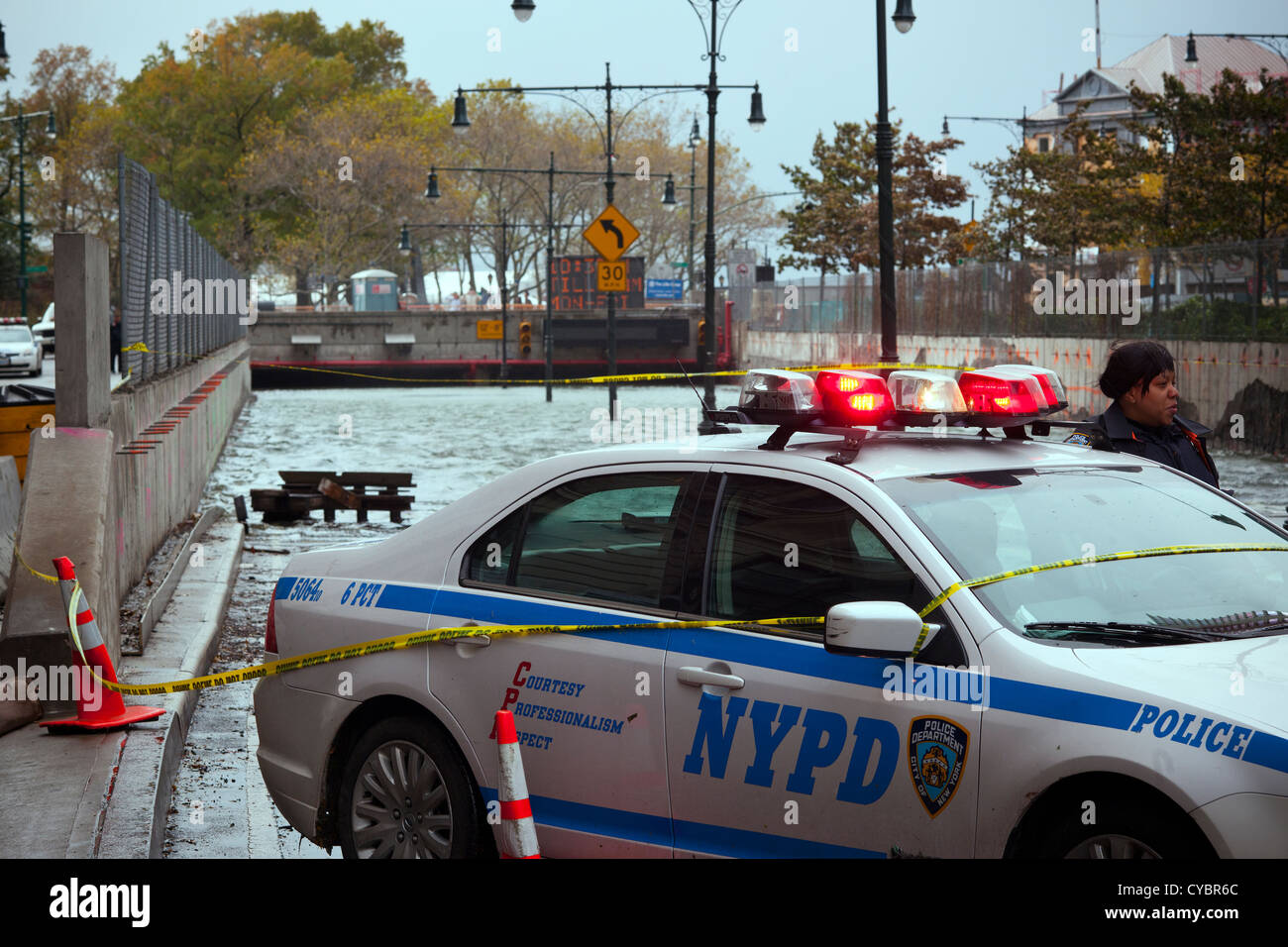 The Battery Park Underpass in New York is seen completely submerged ...