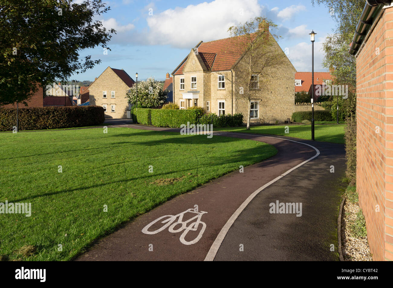 Cycle path through a housing development, England, UK Stock Photo - Alamy