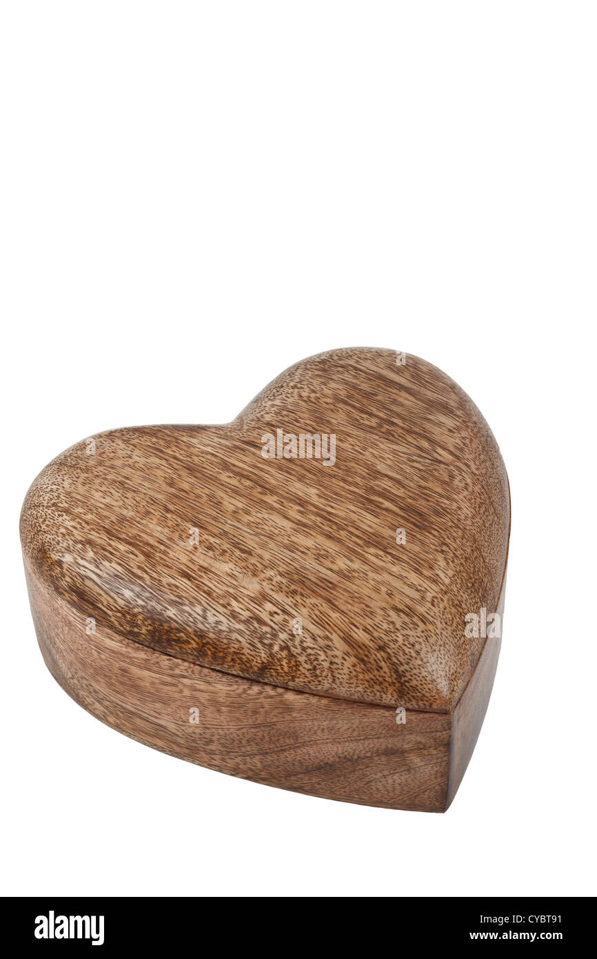 Carved wooden box in the shape of a love heart, isolated on white with ...
