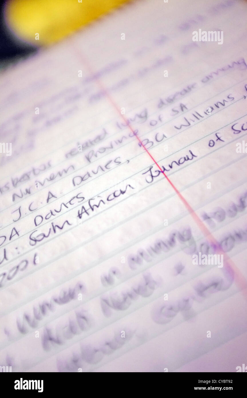 Notebook with handwriting on it Stock Photo - Alamy