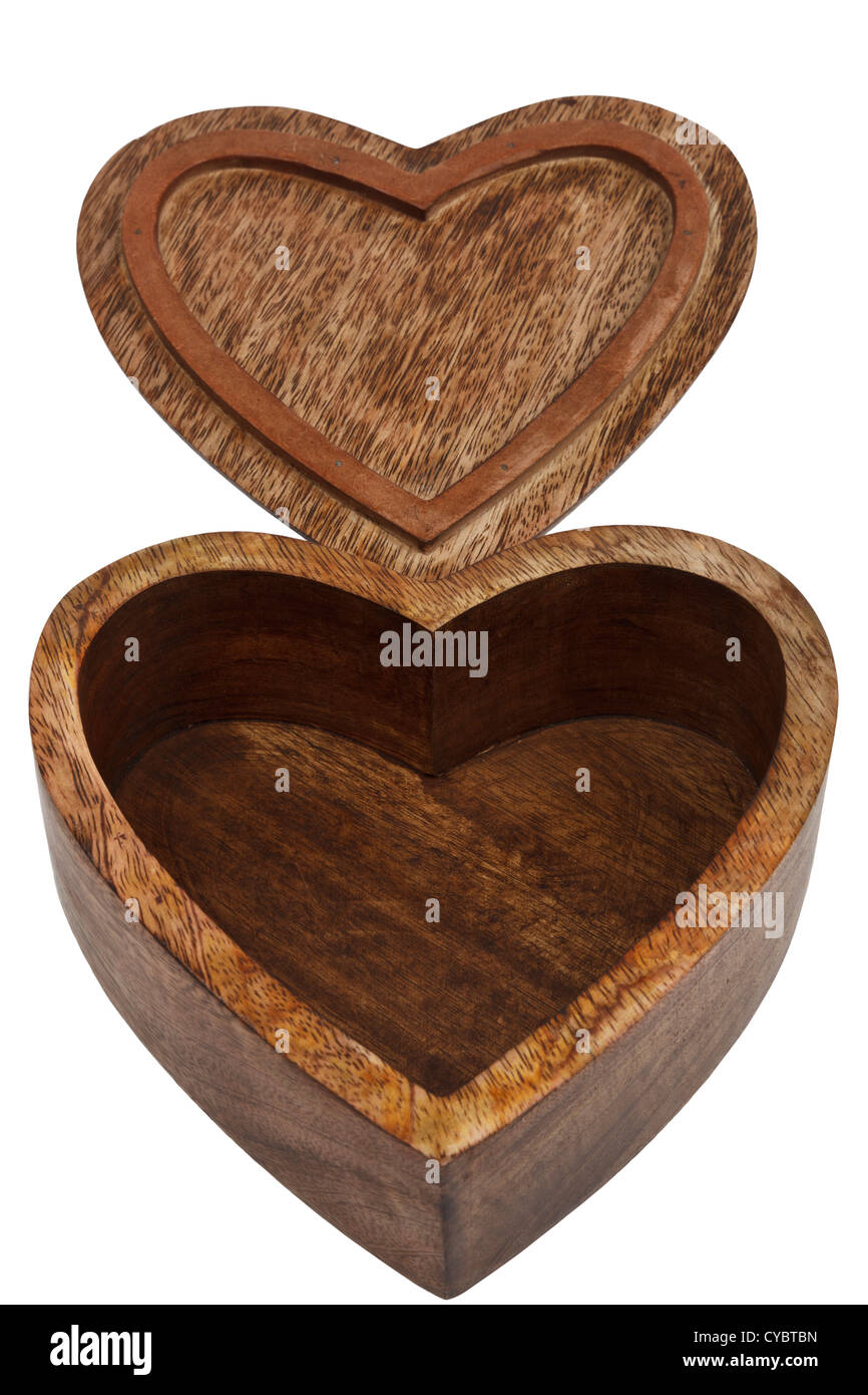 Carved wooden box in the shape of a love heart, isolated on white with ...