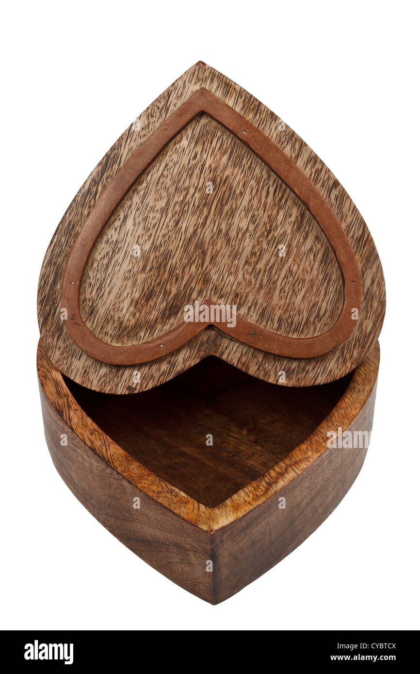 Carved wooden box in the shape of a love heart, isolated on white with ...