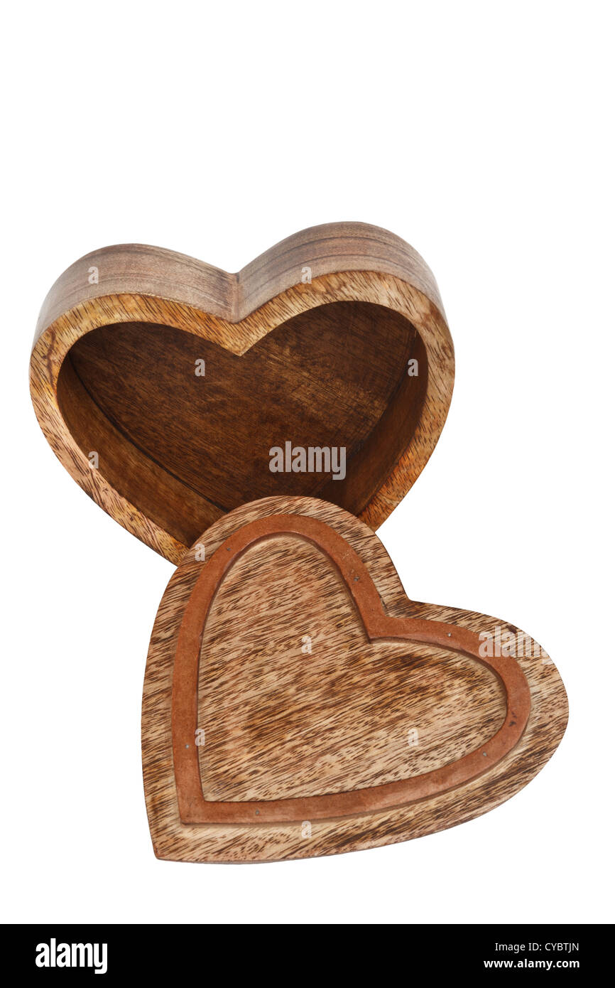 Carved wooden box in the shape of a love heart, isolated on white with ...