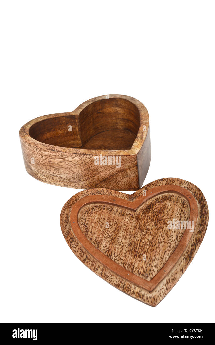 Carved wooden box in the shape of a love heart, isolated on white with ...