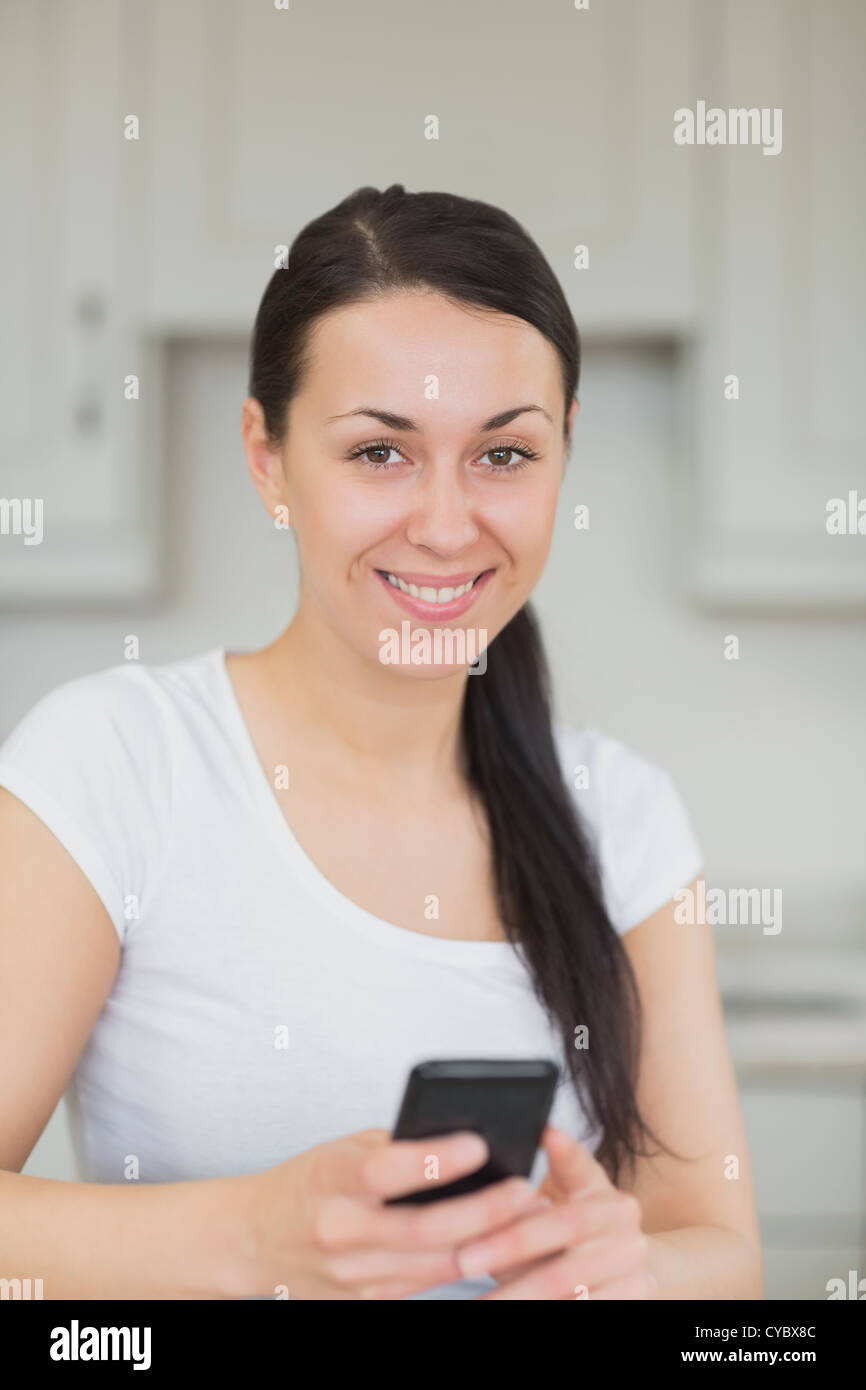 Young woman using the mobile phone Stock Photo - Alamy