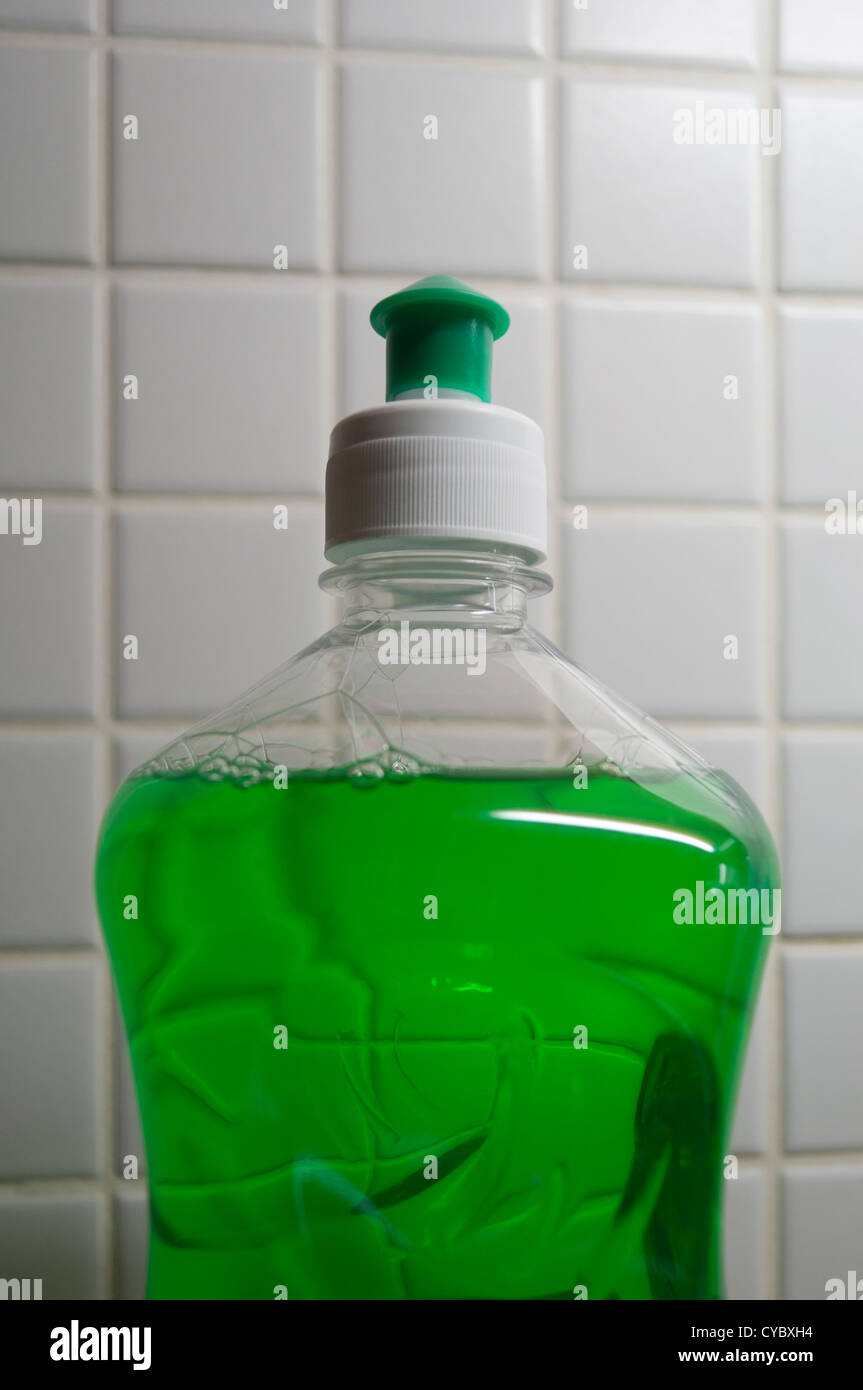 Green washing up liquid Stock Photo - Alamy