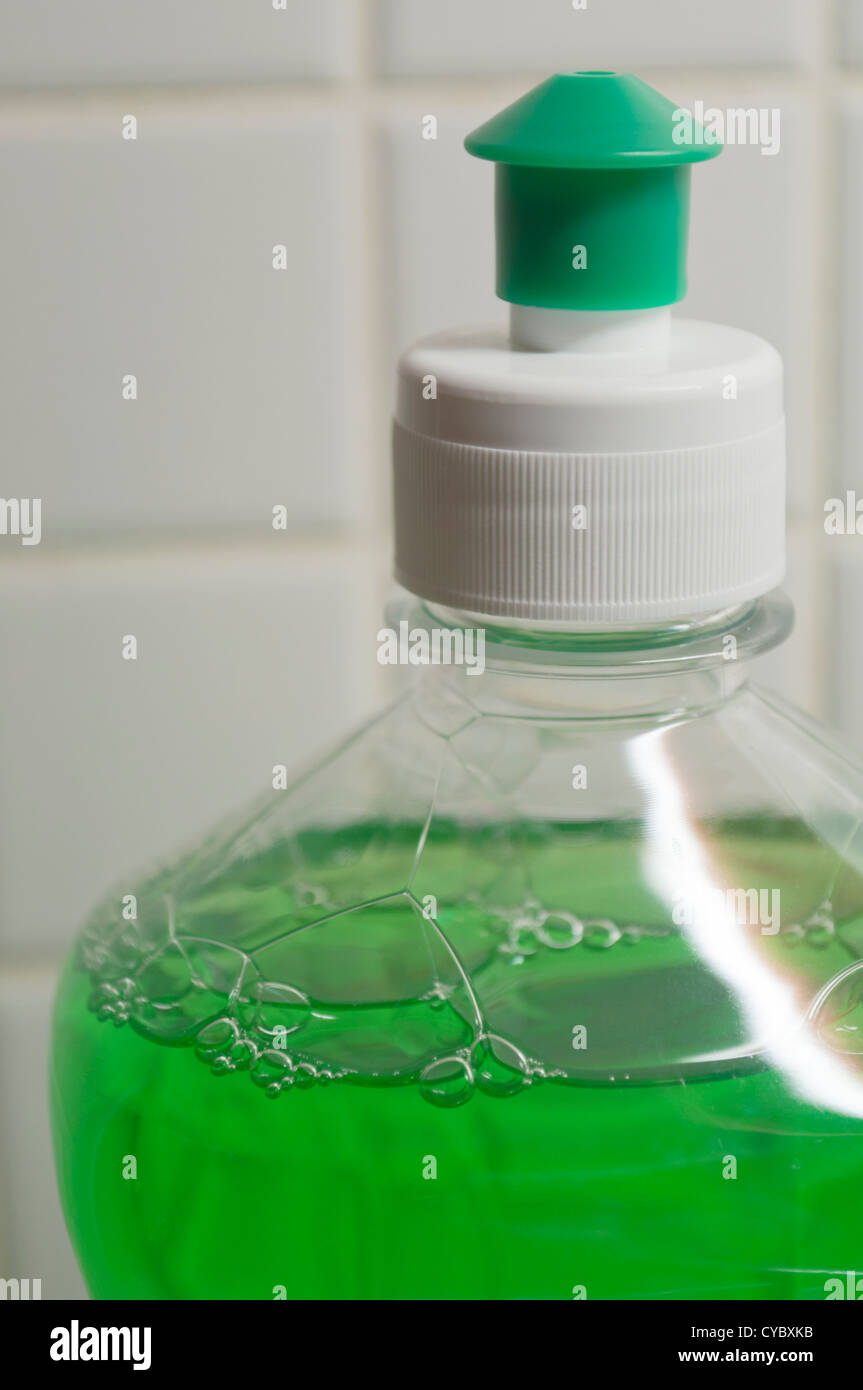 Green washing up liquid Stock Photo - Alamy
