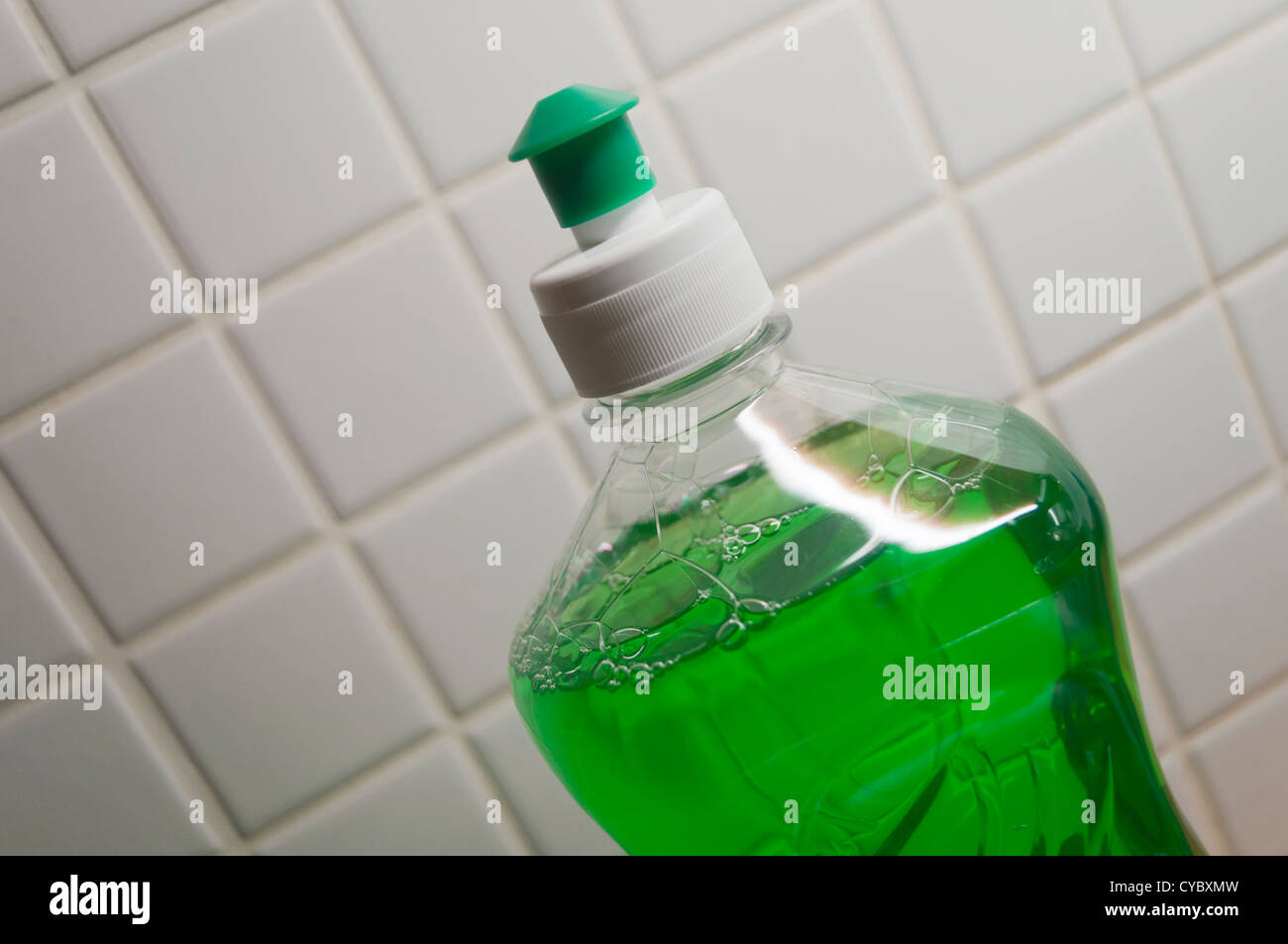 Green washing up liquid Stock Photo - Alamy