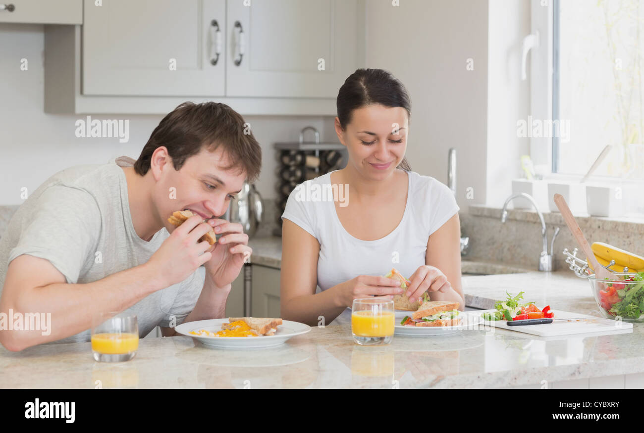 Two friends having lunch together Stock Photo - Alamy