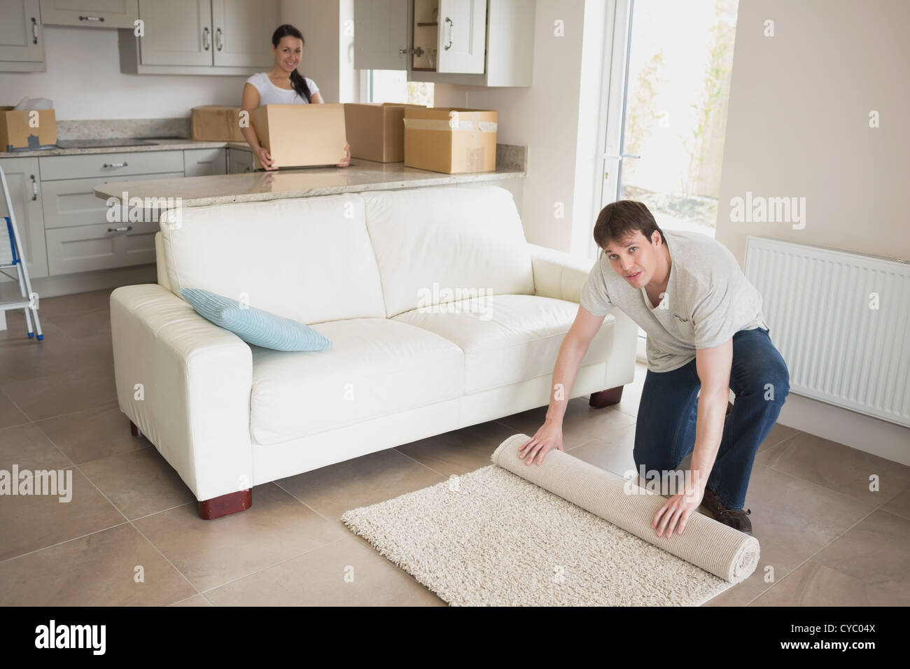 Young relocating people Stock Photo - Alamy