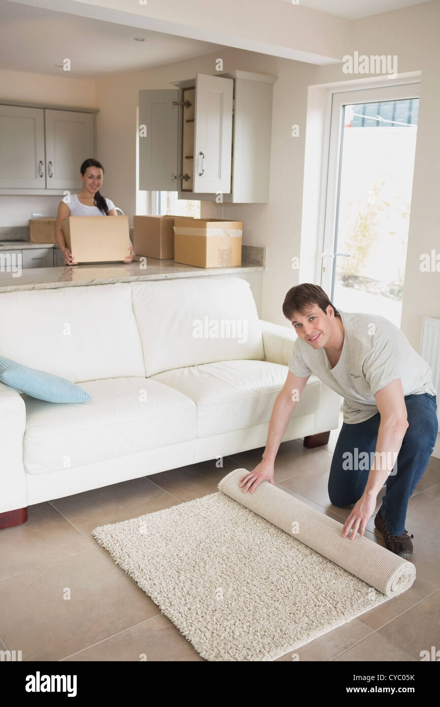 Two young people relocating Stock Photo - Alamy