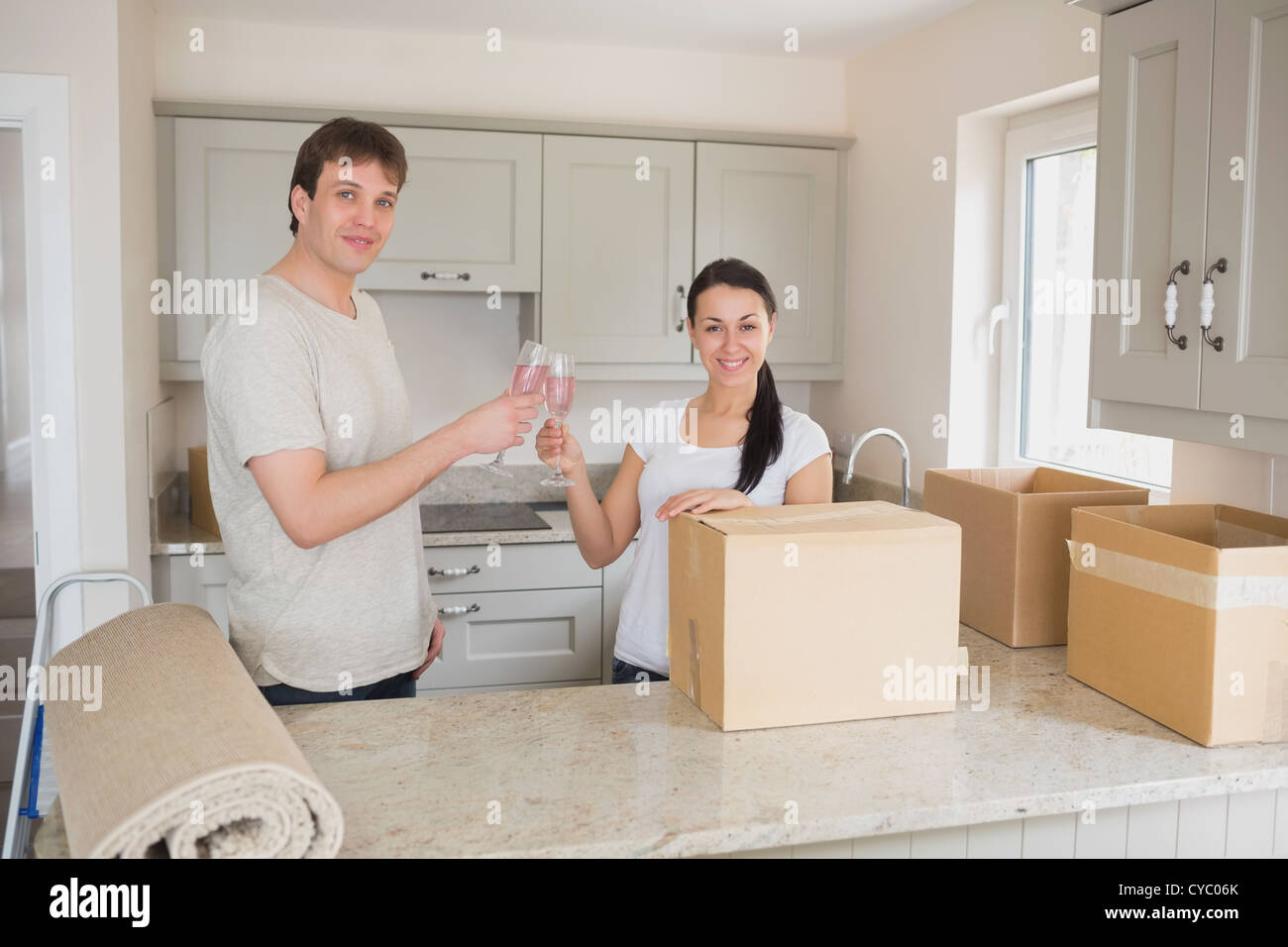 Two people celebrating the relocation Stock Photo - Alamy