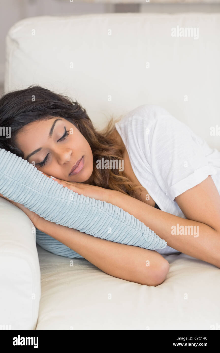 Brunette taking nap Stock Photo - Alamy