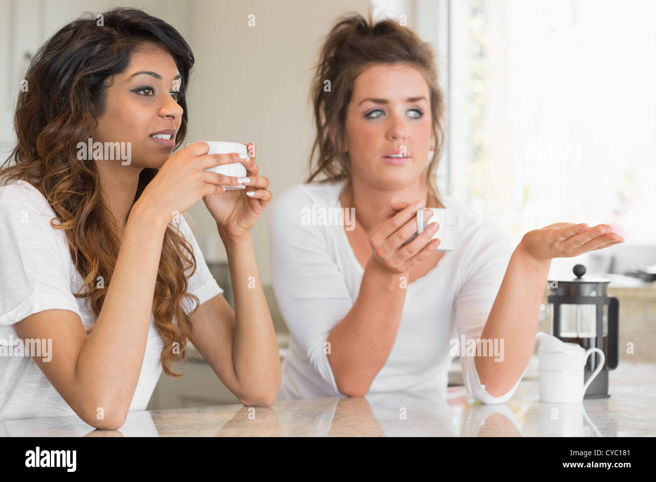 Girls chatting over coffee Stock Photo - Alamy
