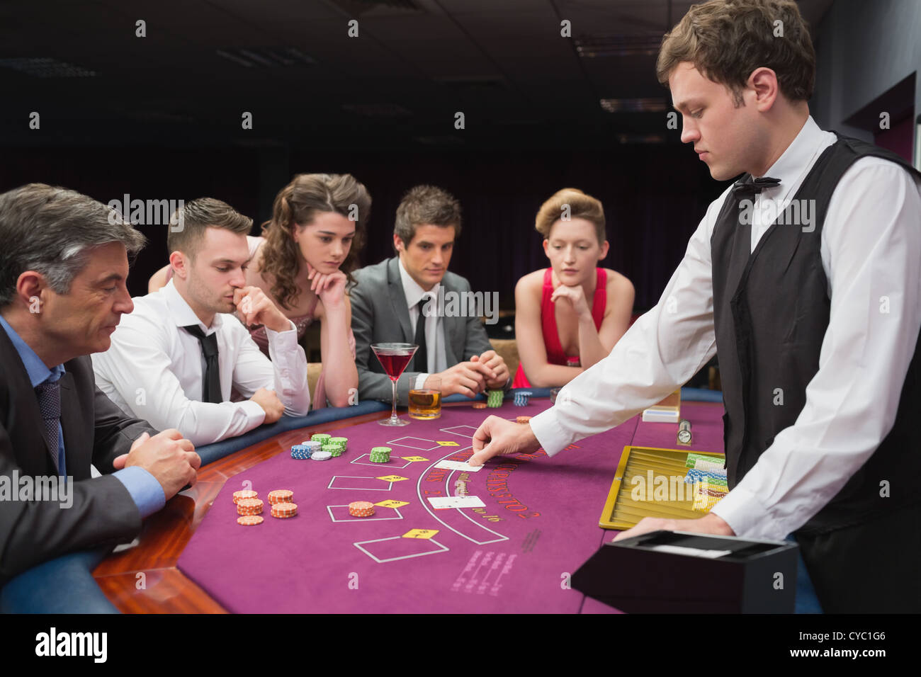 People playing poker serious hi-res stock photography and images - Alamy