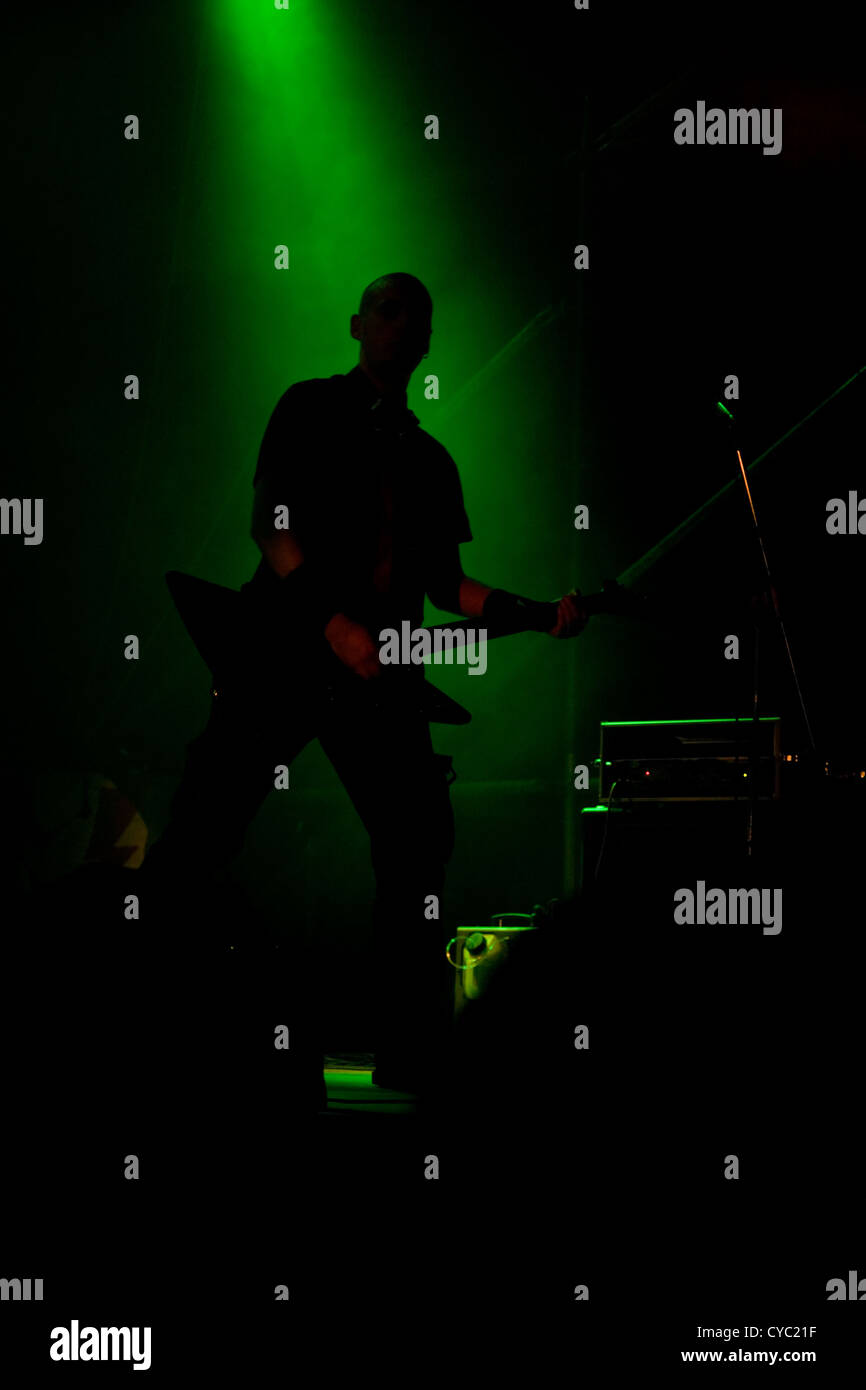 Anonymous musician on the stage, laser show Stock Photo - Alamy