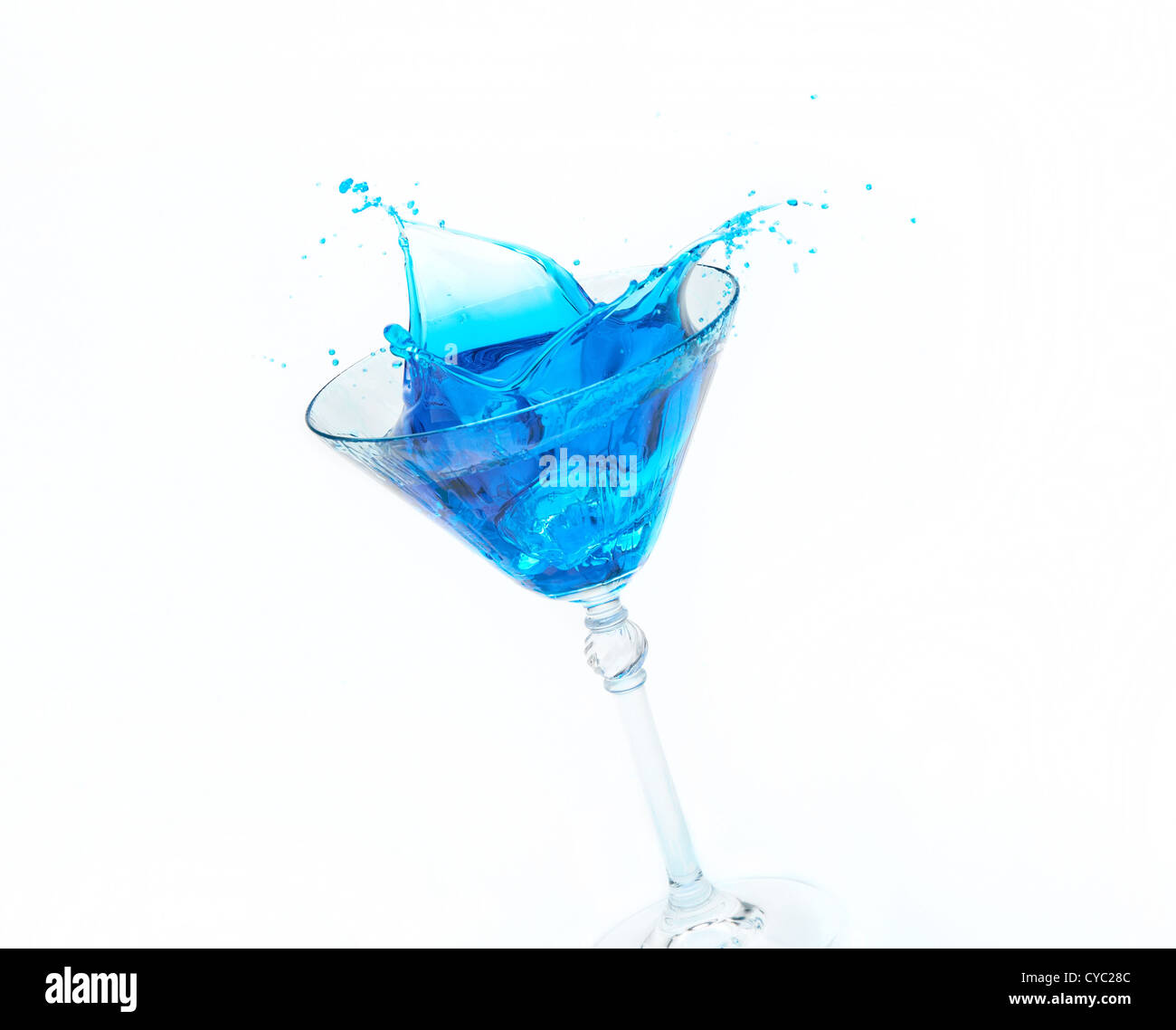 Blue splash in glass Stock Photo - Alamy