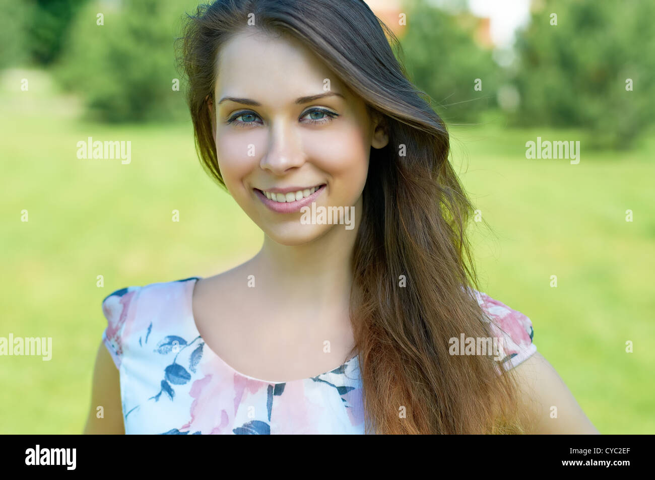 Beautiful young woman smiling Stock Photo - Alamy
