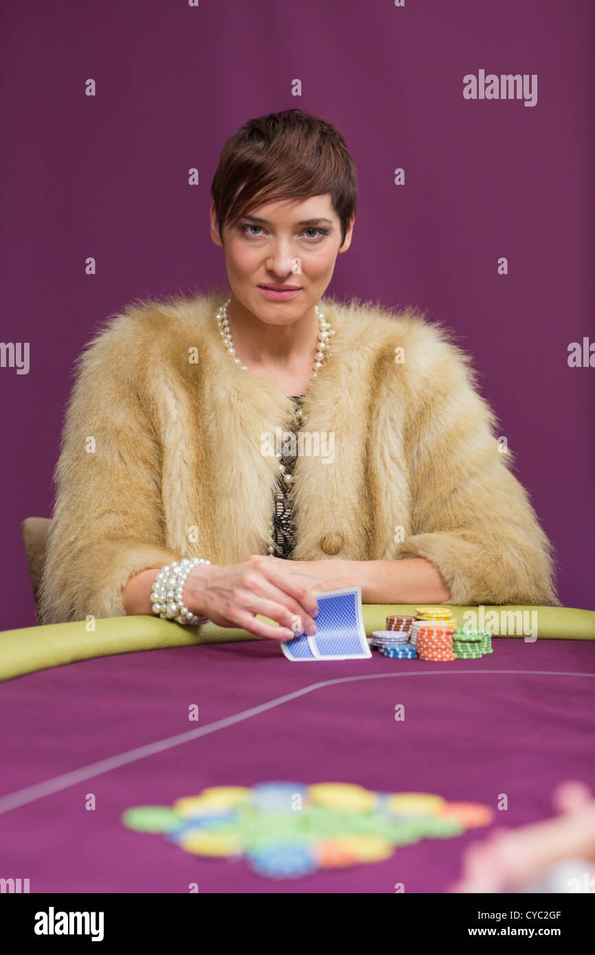 Angry woman at poker table Stock Photo - Alamy