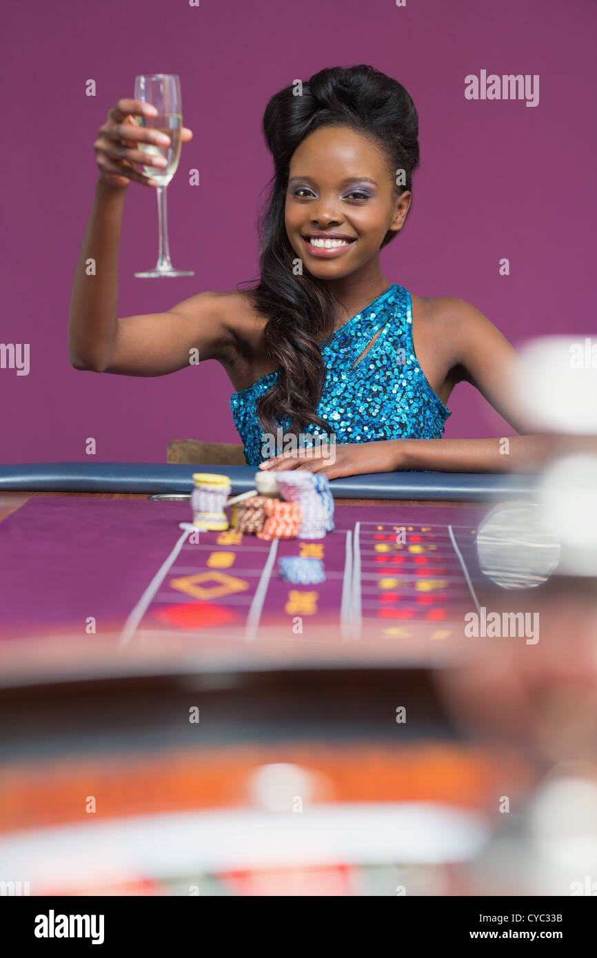 Woman champagne roulette table hi-res stock photography and images - Alamy